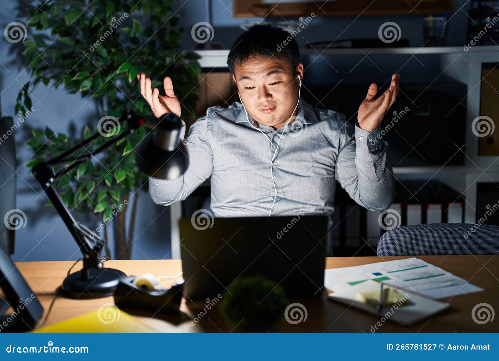 Young Chinese Man Working Using Computer Laptop at Night Clueless and ...