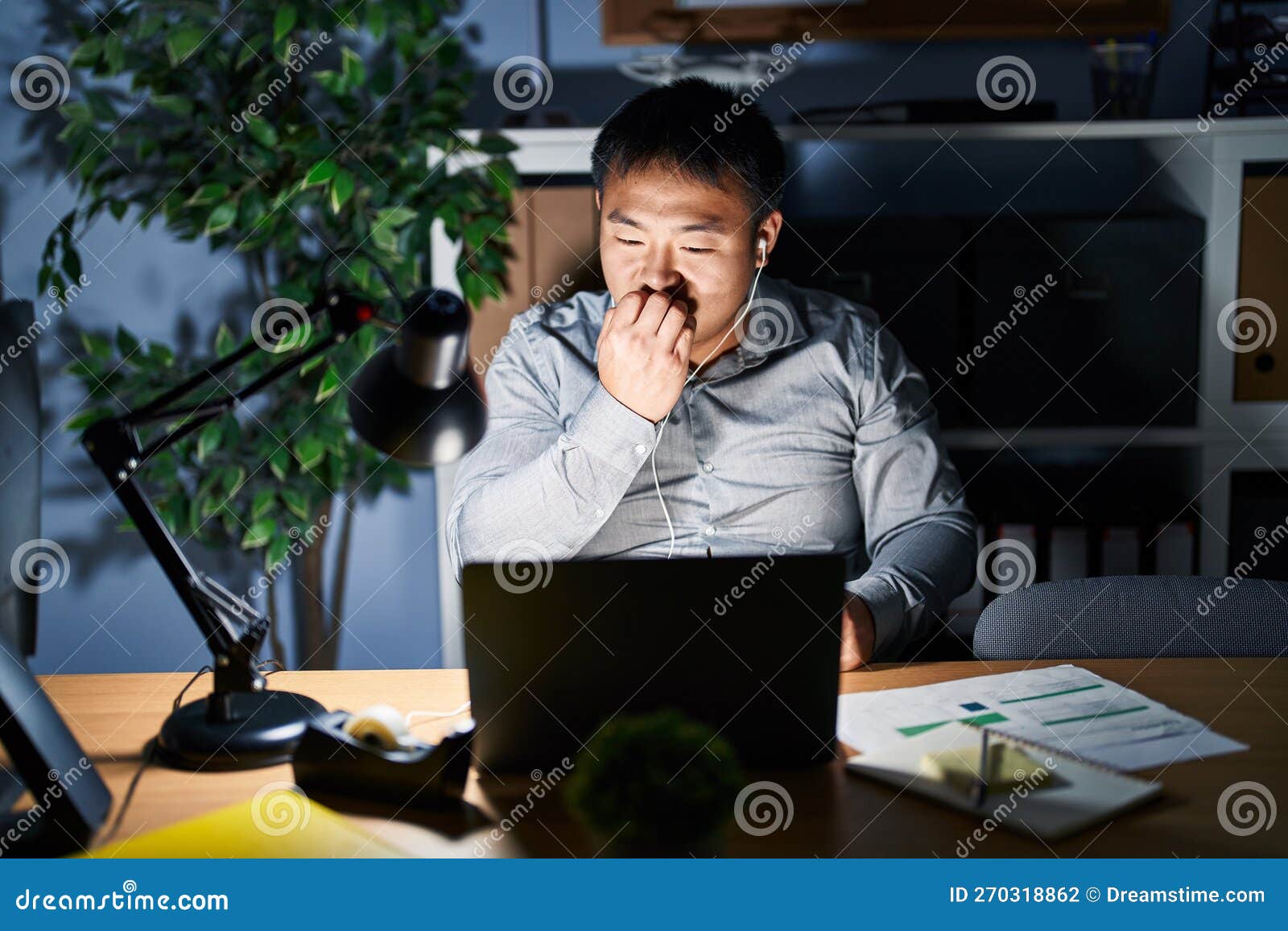 Young Chinese Man Working Using Computer Laptop at Night Looking ...