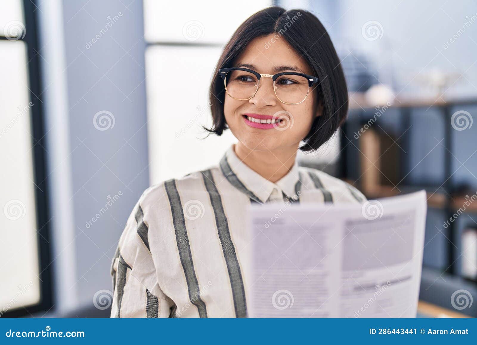 Young Chinese Woman Business Worker Reading Document at Office Stock ... Young Chinese Woman Business Worker Reading Document at Office Stock ...