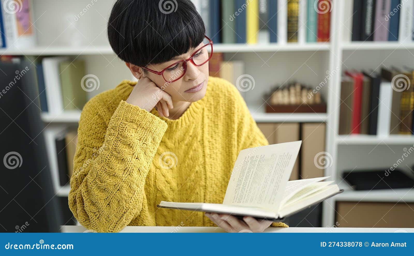 Young Chinese Woman Student Reading Book Studying at Library University ...