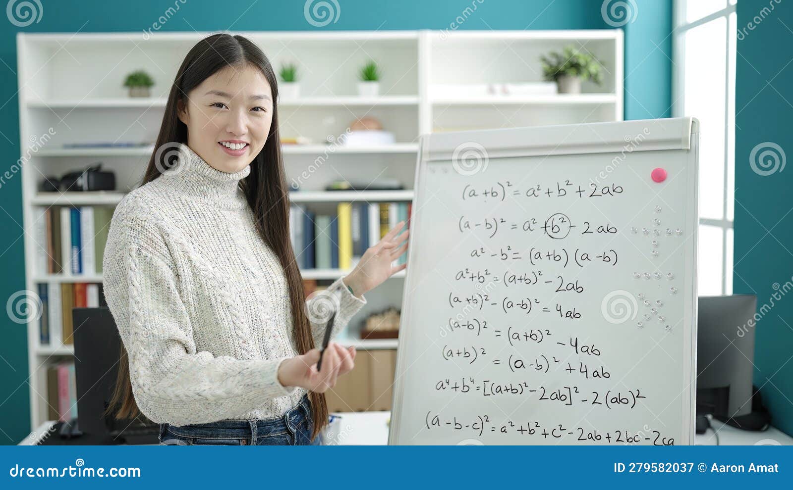Young Chinese Woman Student Smiling Confident Explaining Maths Exercise ...