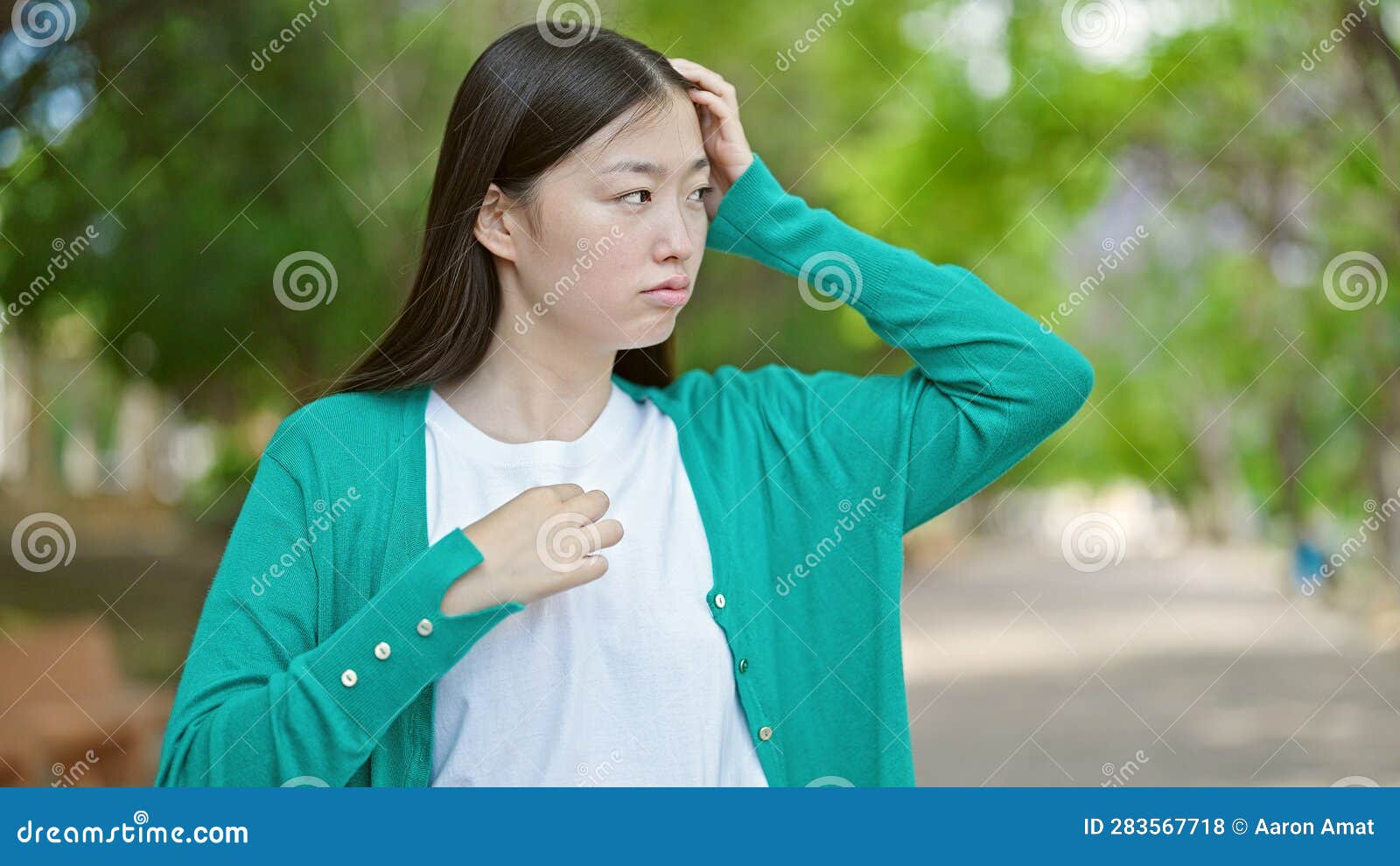 Young Chinese Woman Suffering for Headache at Park Stock Photo - Image ...