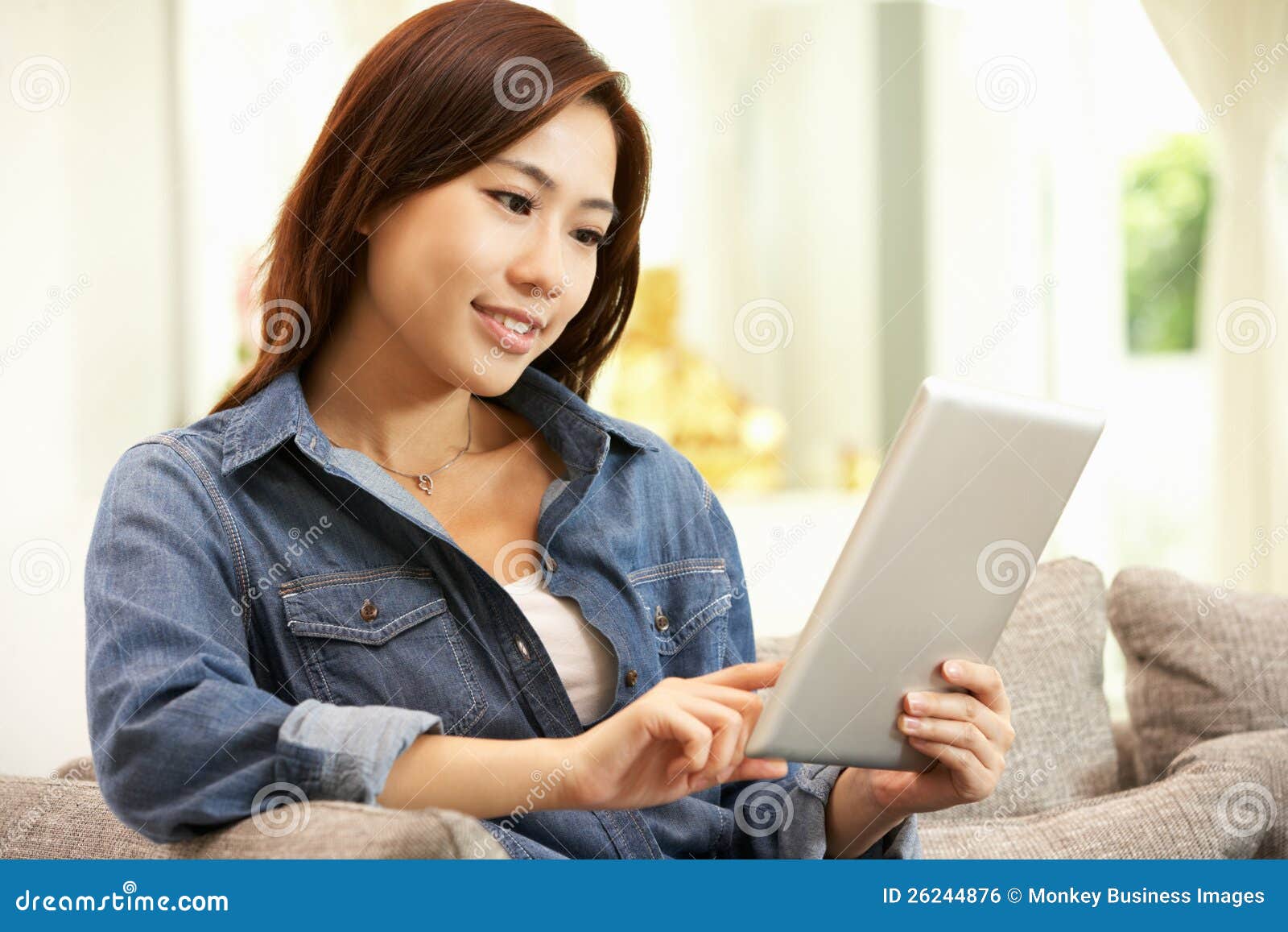 Young Chinese Woman Using Digital Tablet Stock Photo - Image of ...