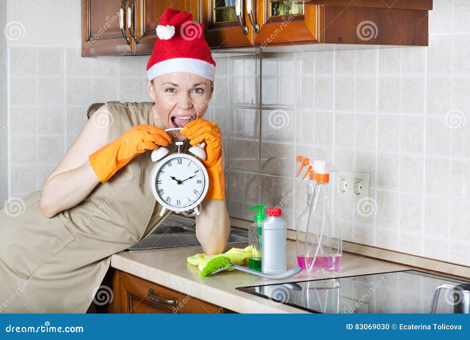 Young Cleaning Lady with Alarm Clock Stock Photo - Image of glass ...