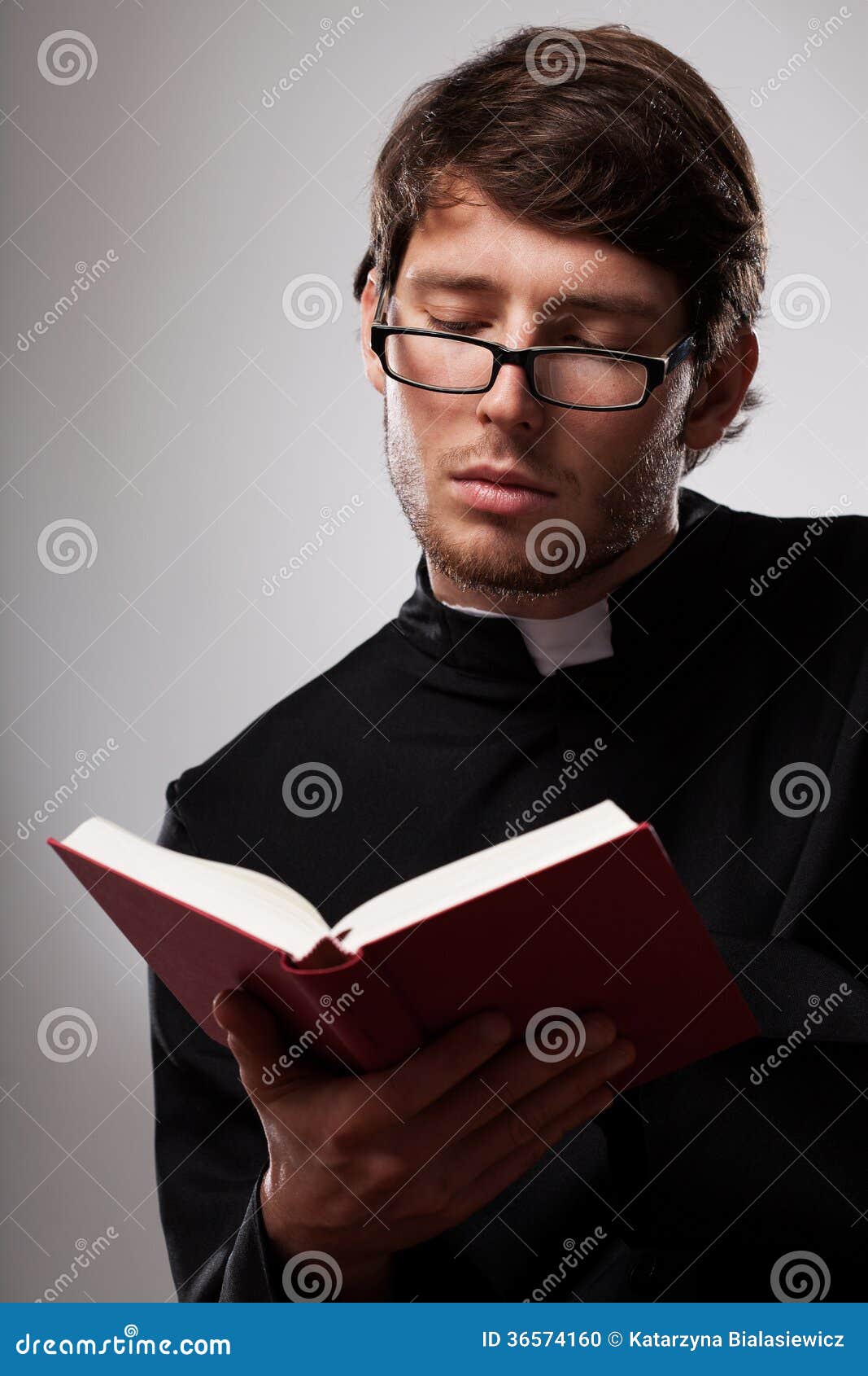 Young Clergyman Studying a Bible Stock Photo - Image of christian ...