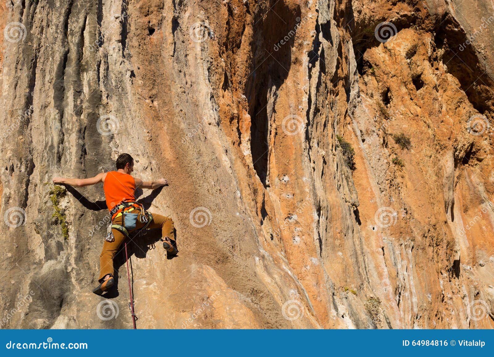 Young Climber Hanging by a Cliff. Stock Photo - Image of alone, explore ...