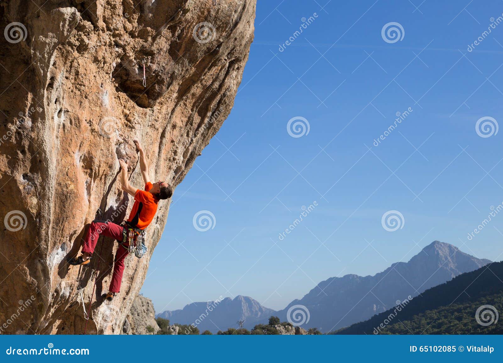 Young Climber Hanging by a Cliff. Stock Image - Image of fearless ...
