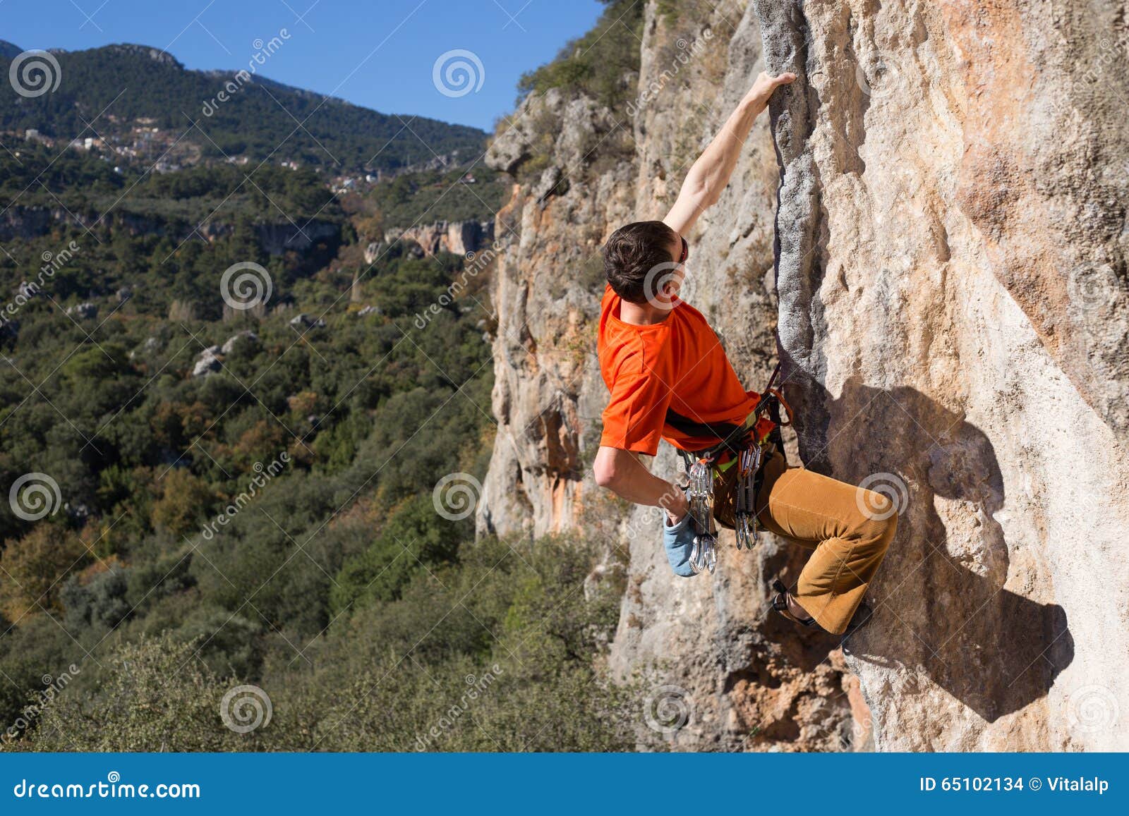 Young Climber Hanging by a Cliff. Stock Photo - Image of grip, climber ...