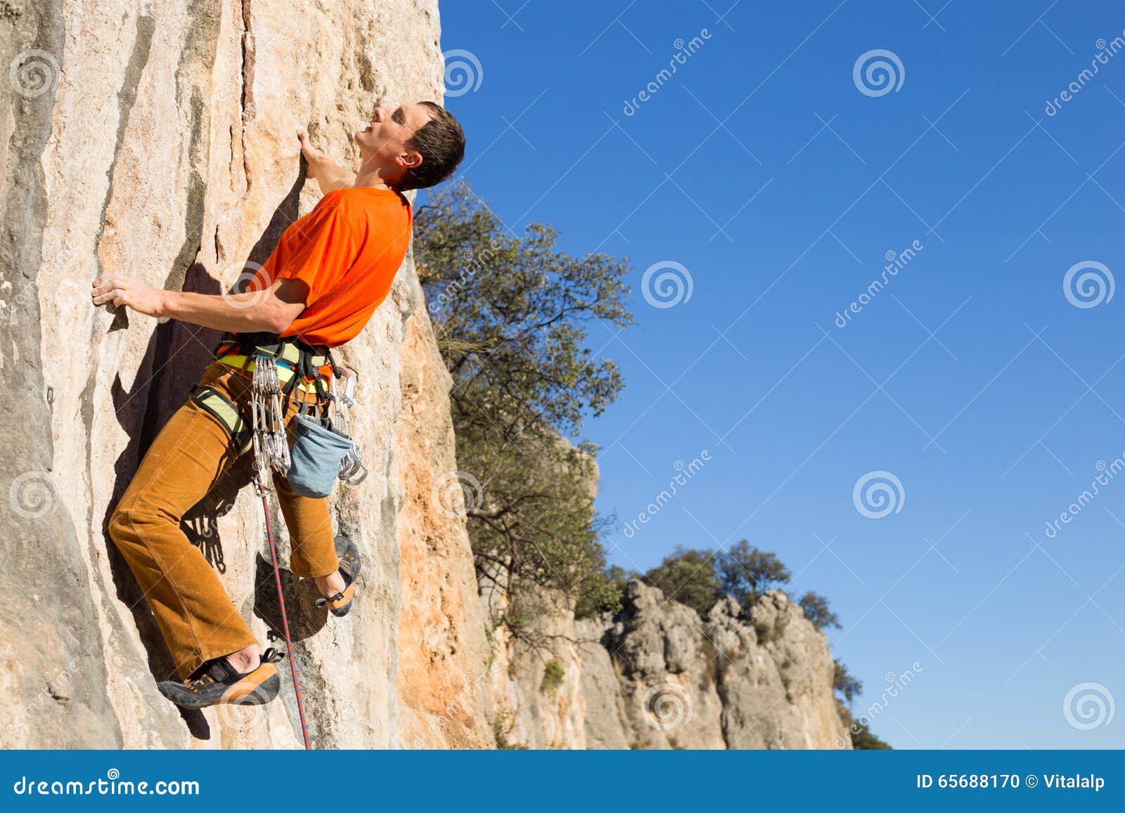 Young Climber Hanging by a Cliff Stock Photo - Image of courage ...