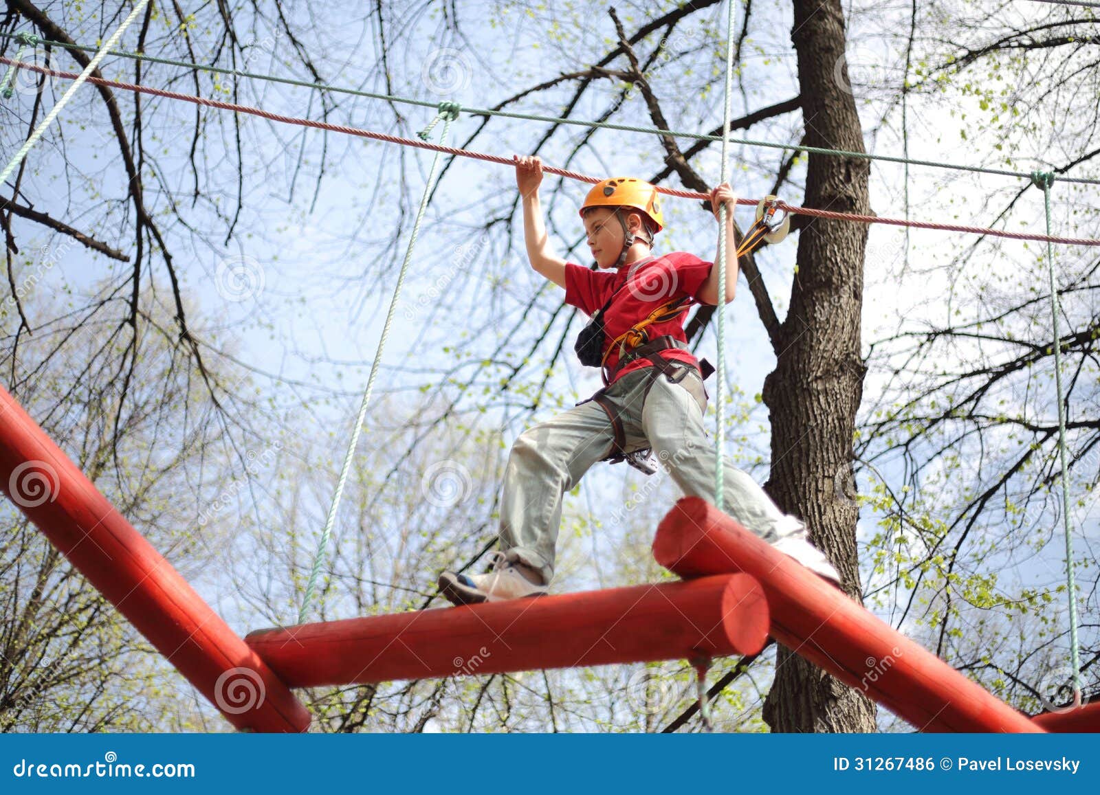 Young Climber Skilfully Go on a Suspension Bridge Stock Photo - Image ...