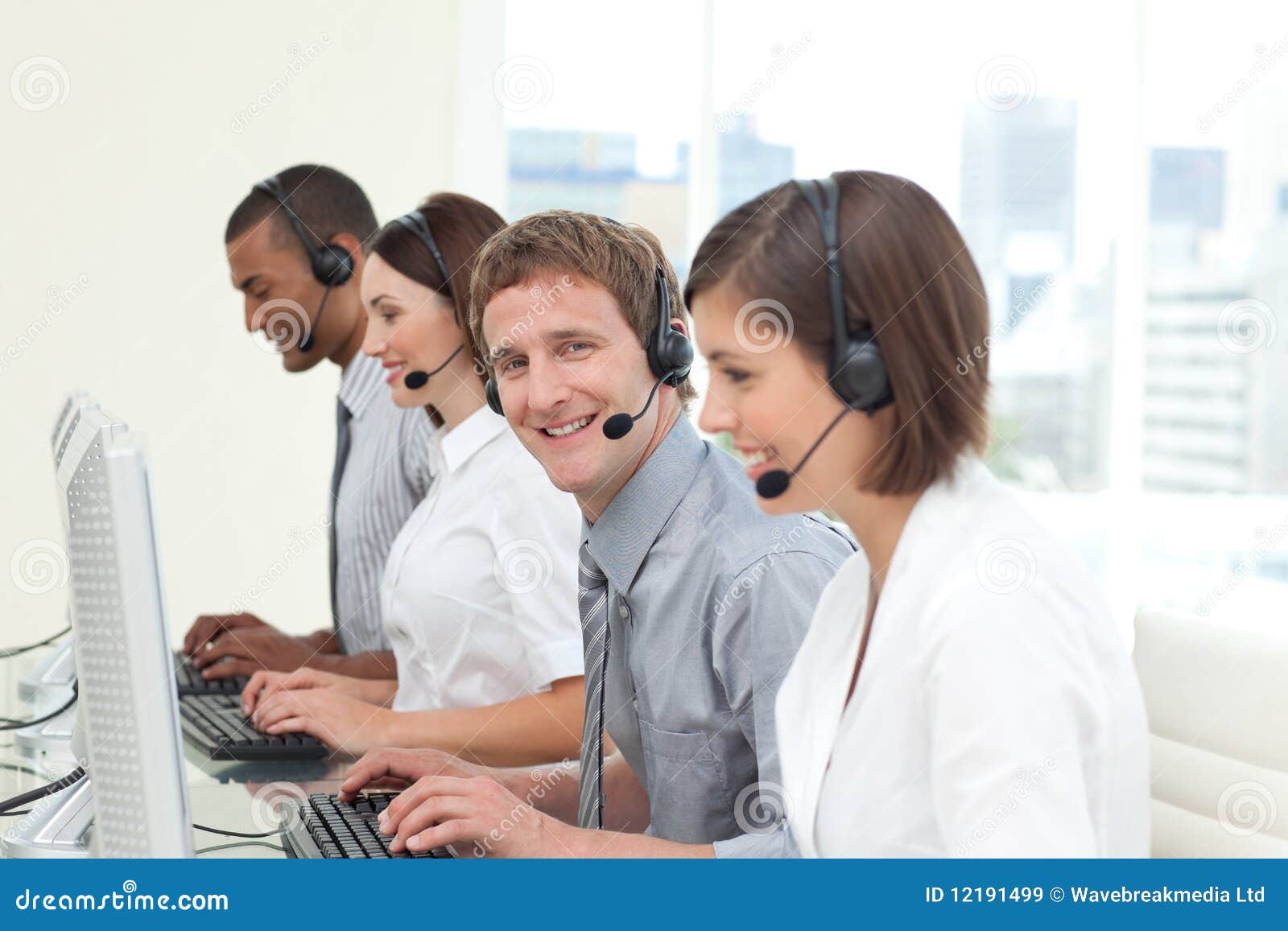 Young Co-workers with Headset on Stock Image - Image of male, ethnic ...