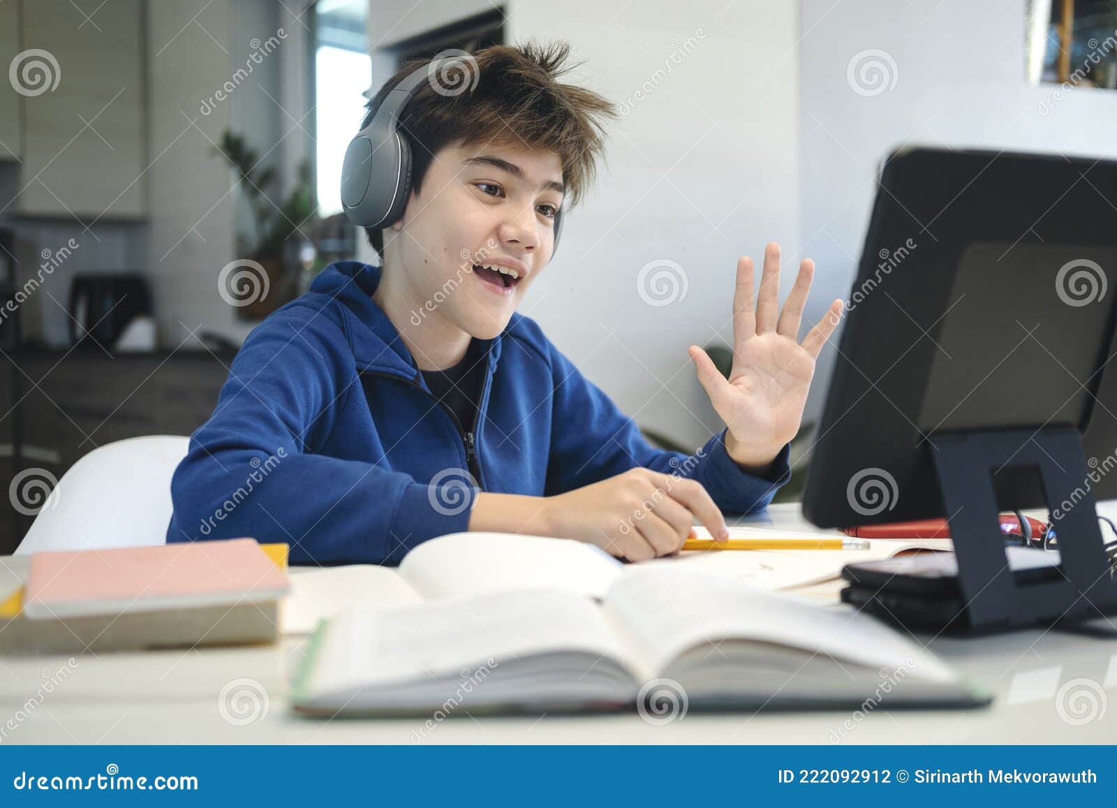 Young Collage Student Using Computer and Mobile Device Studying Online ...