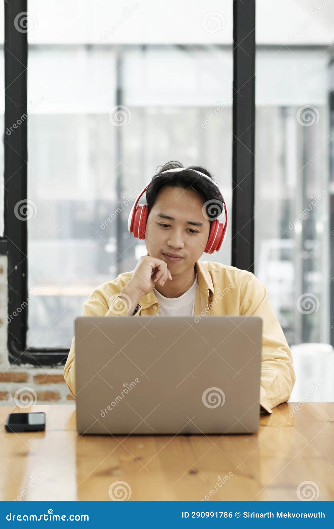 Young Collage Student Using Computer and Mobile Device Studying Online ...