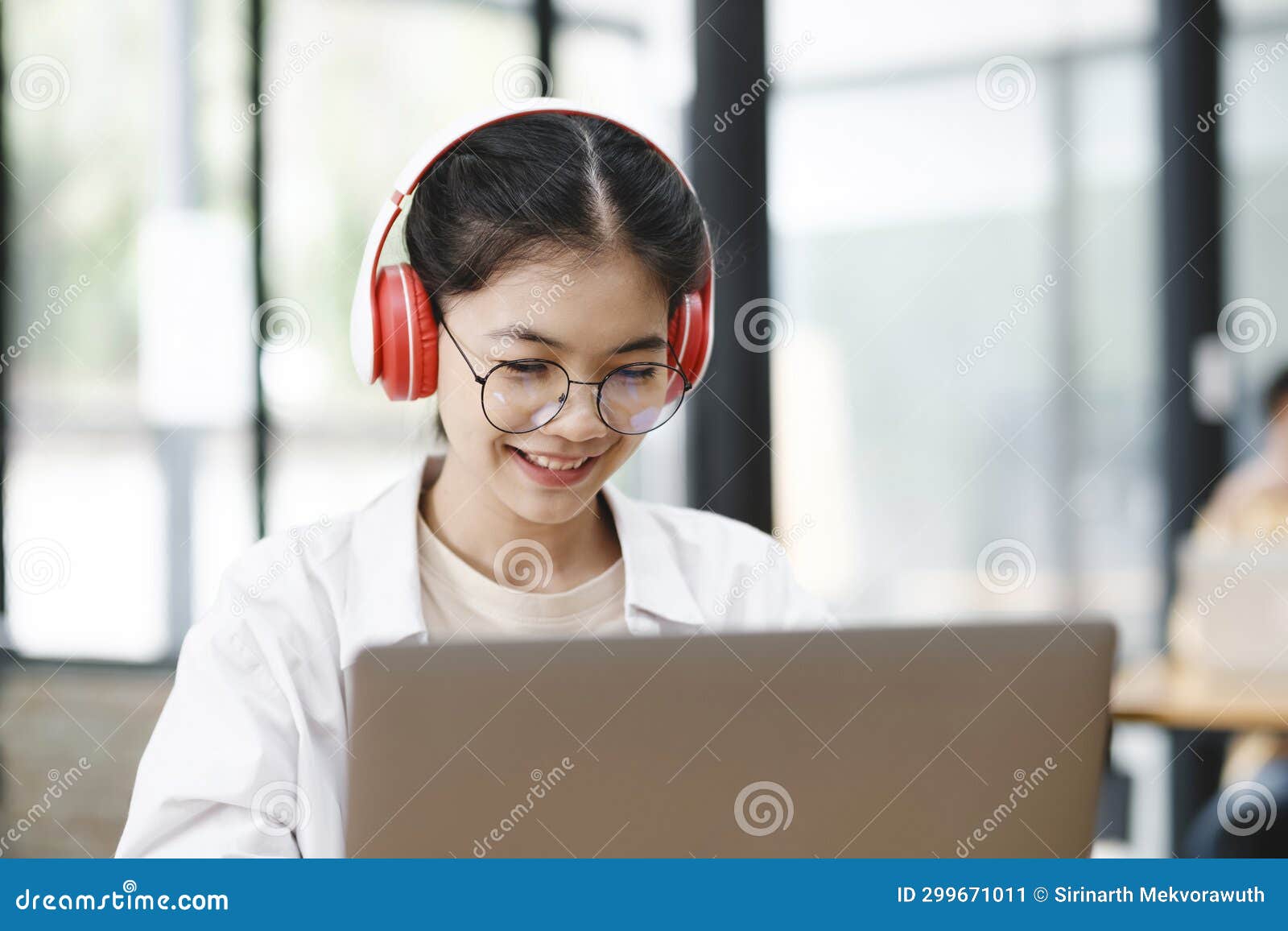 Young Collage Student Using Computer and Mobile Device Studying Online ...