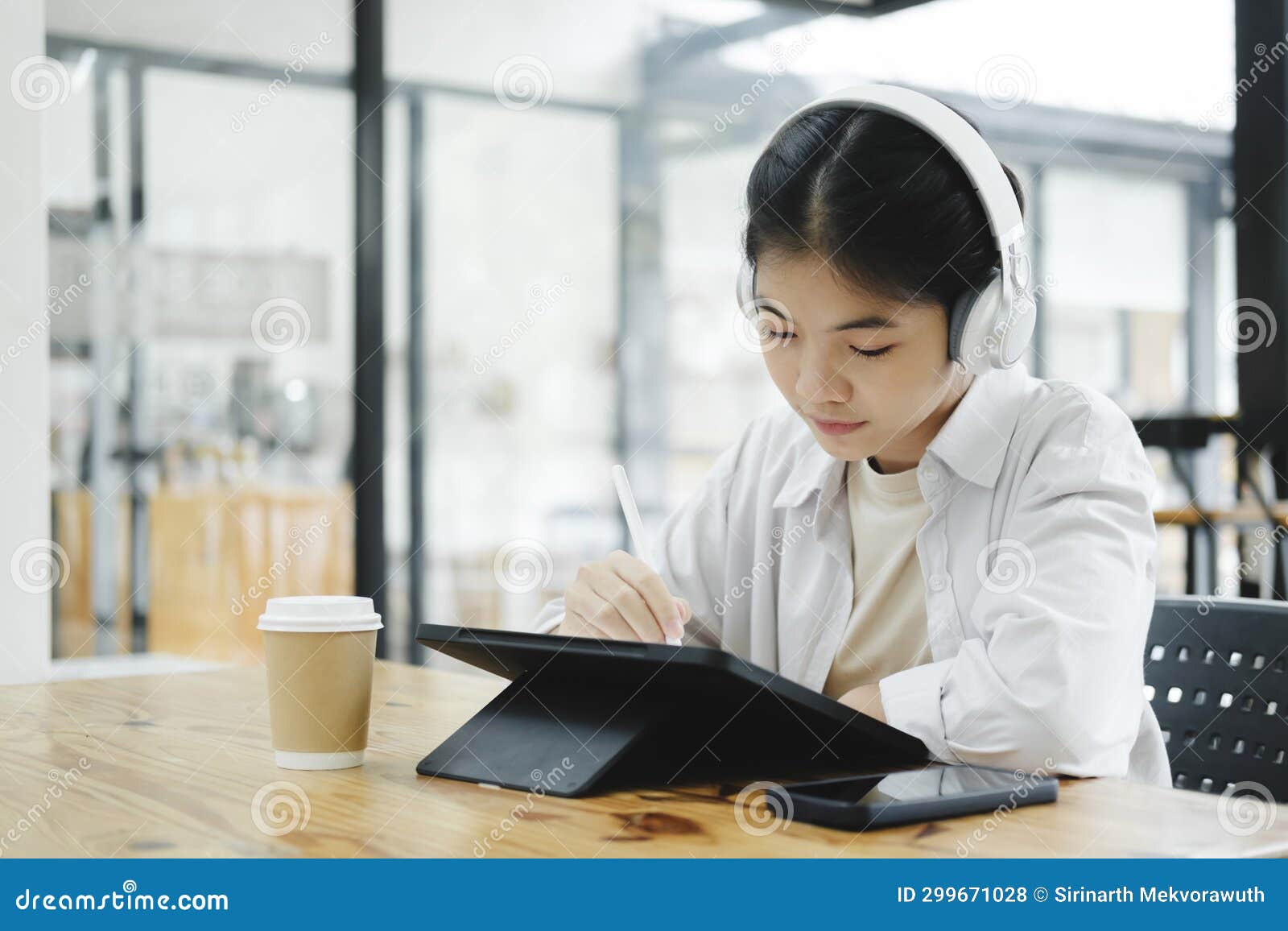 Young Collage Student Using Computer and Mobile Device Studying Online ...