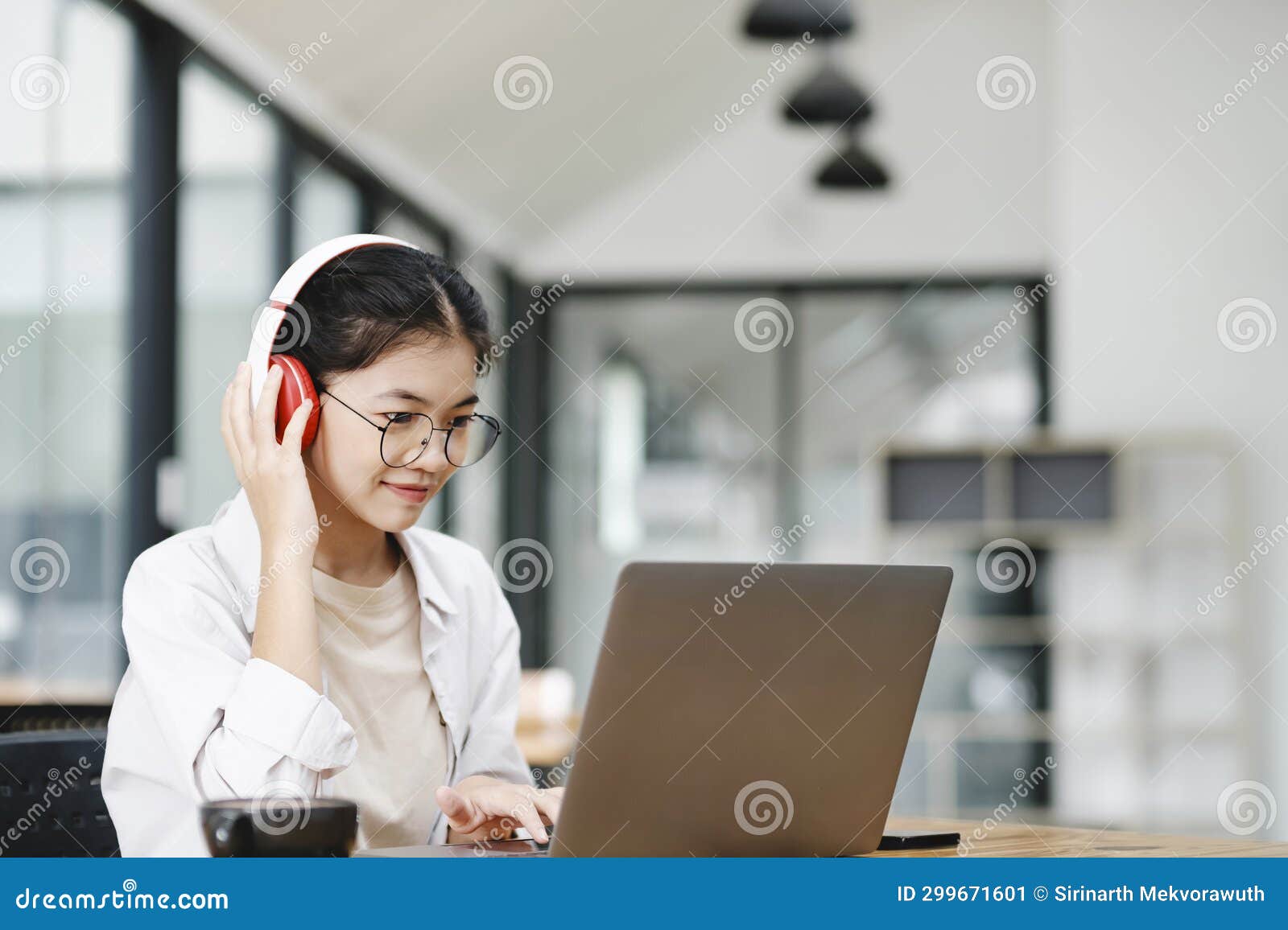 Young Collage Student Using Computer and Mobile Device Studying Online ...