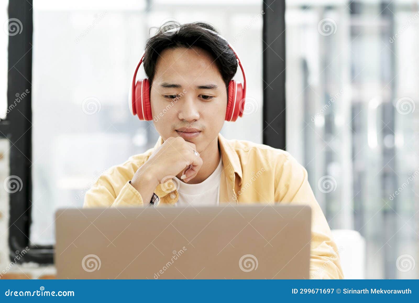 Young Collage Student Using Computer and Mobile Device Studying Online ...