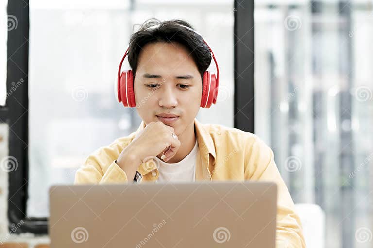 Young Collage Student Using Computer and Mobile Device Studying Online ...