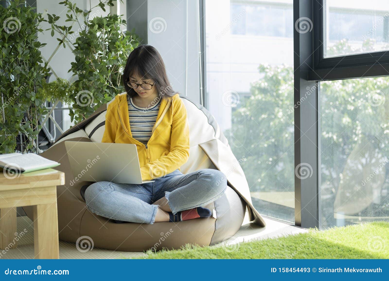 Young Collage Student Using Computer and Mobile Device Studying Online ...