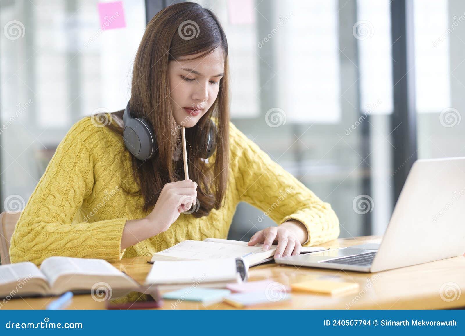 Young Collage Student Using Computer and Mobile Device Studying Online ...
