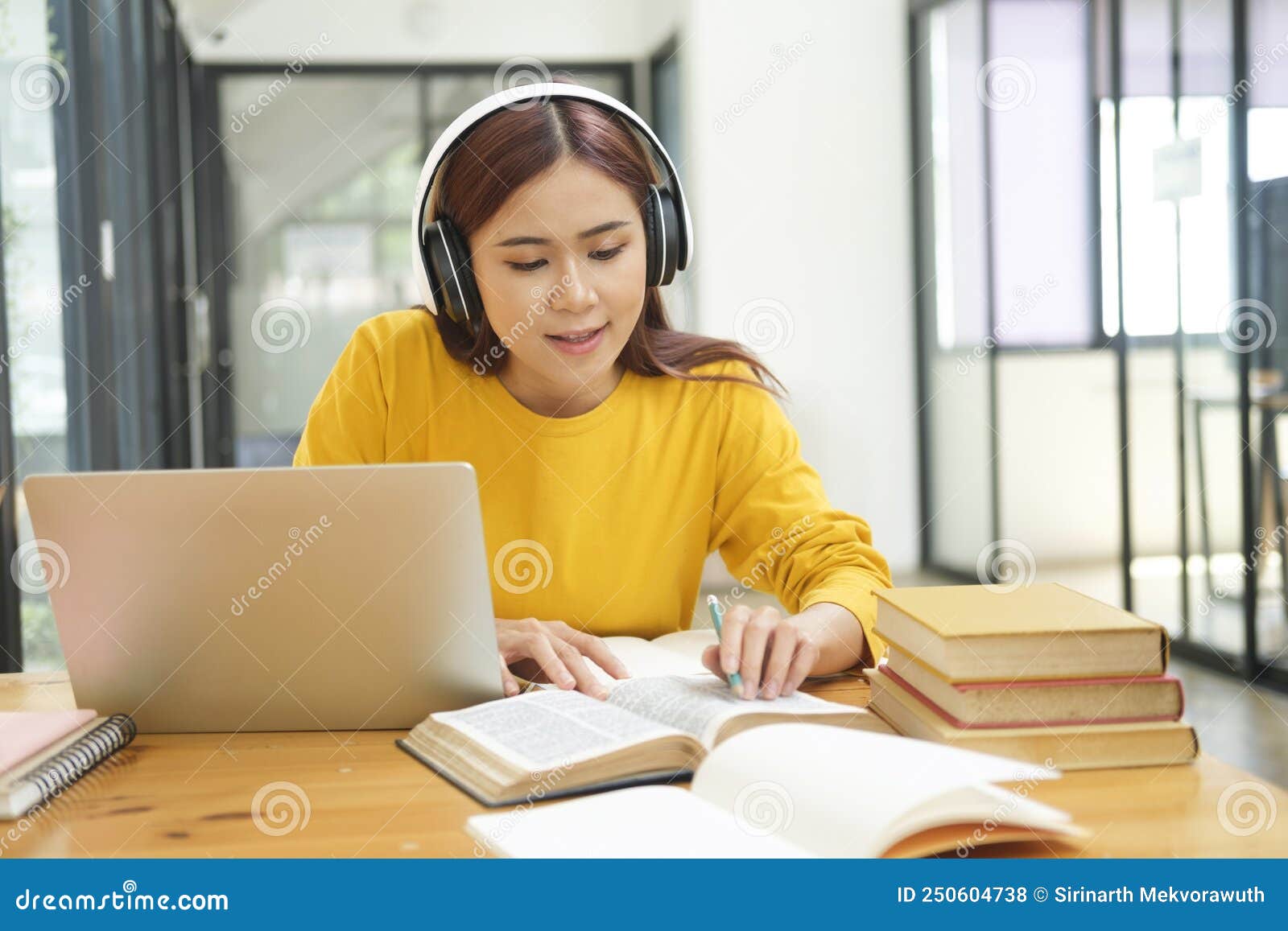 Young Collage Student Using Computer and Mobile Device Studying Online ...