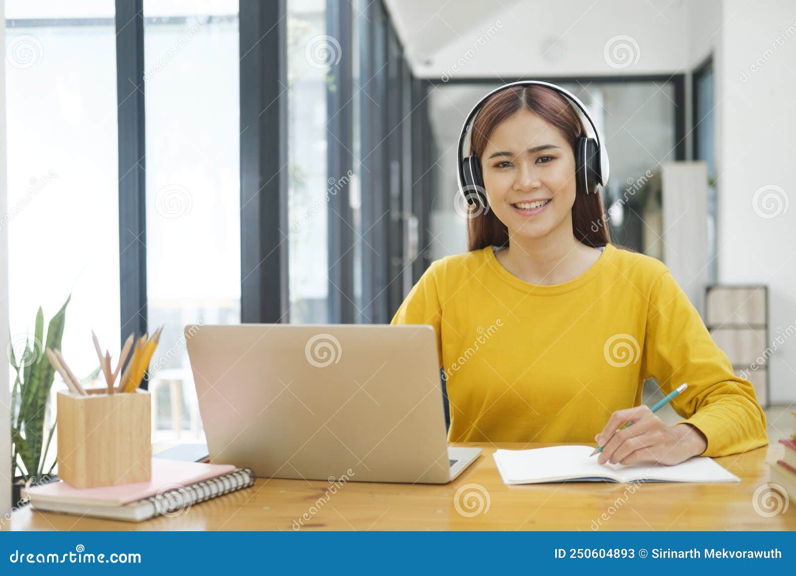 Young Collage Student Using Computer and Mobile Device Studying Online ...