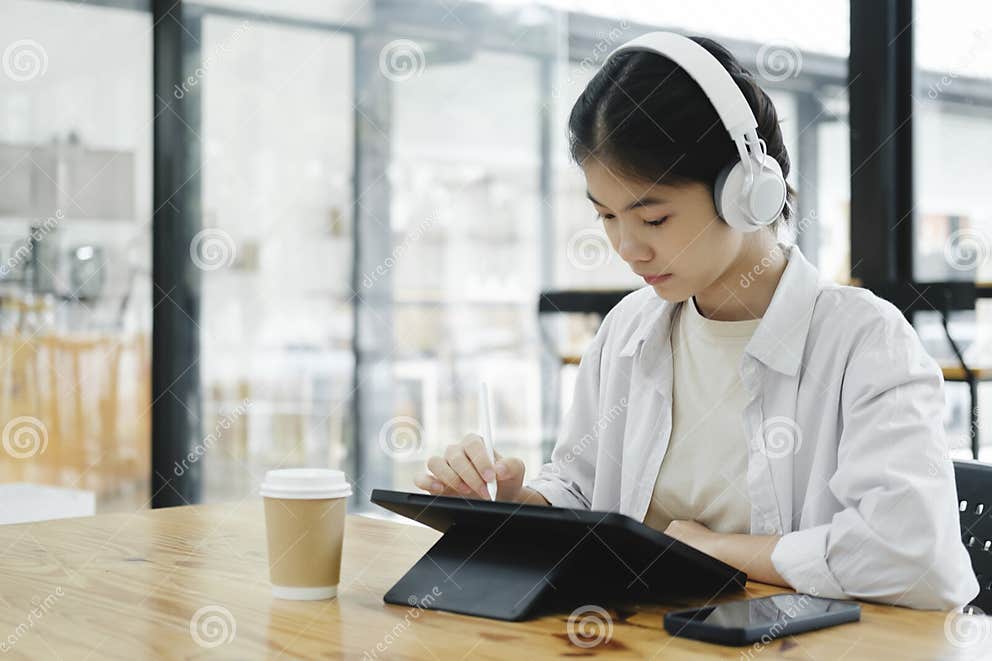 Young Collage Student Using Computer and Mobile Device Studying Online ...