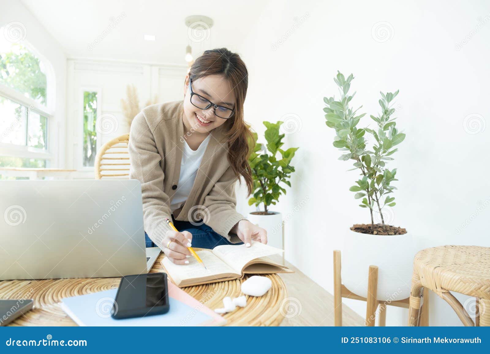 Young Collage Student Using Computer and Mobile Device Studying Online ...