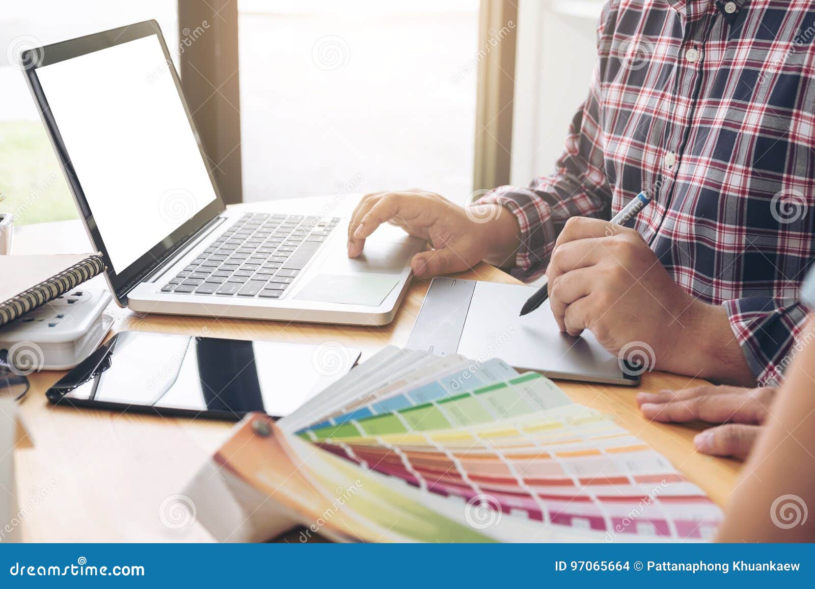 Young Colleagues Designers Working Together on a Creative Project and ...