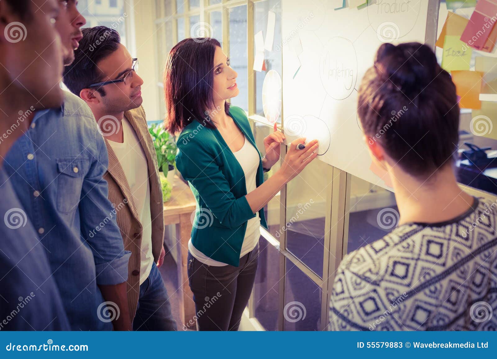 Young Colleagues in Discussion at Office Stock Image - Image of happy ...