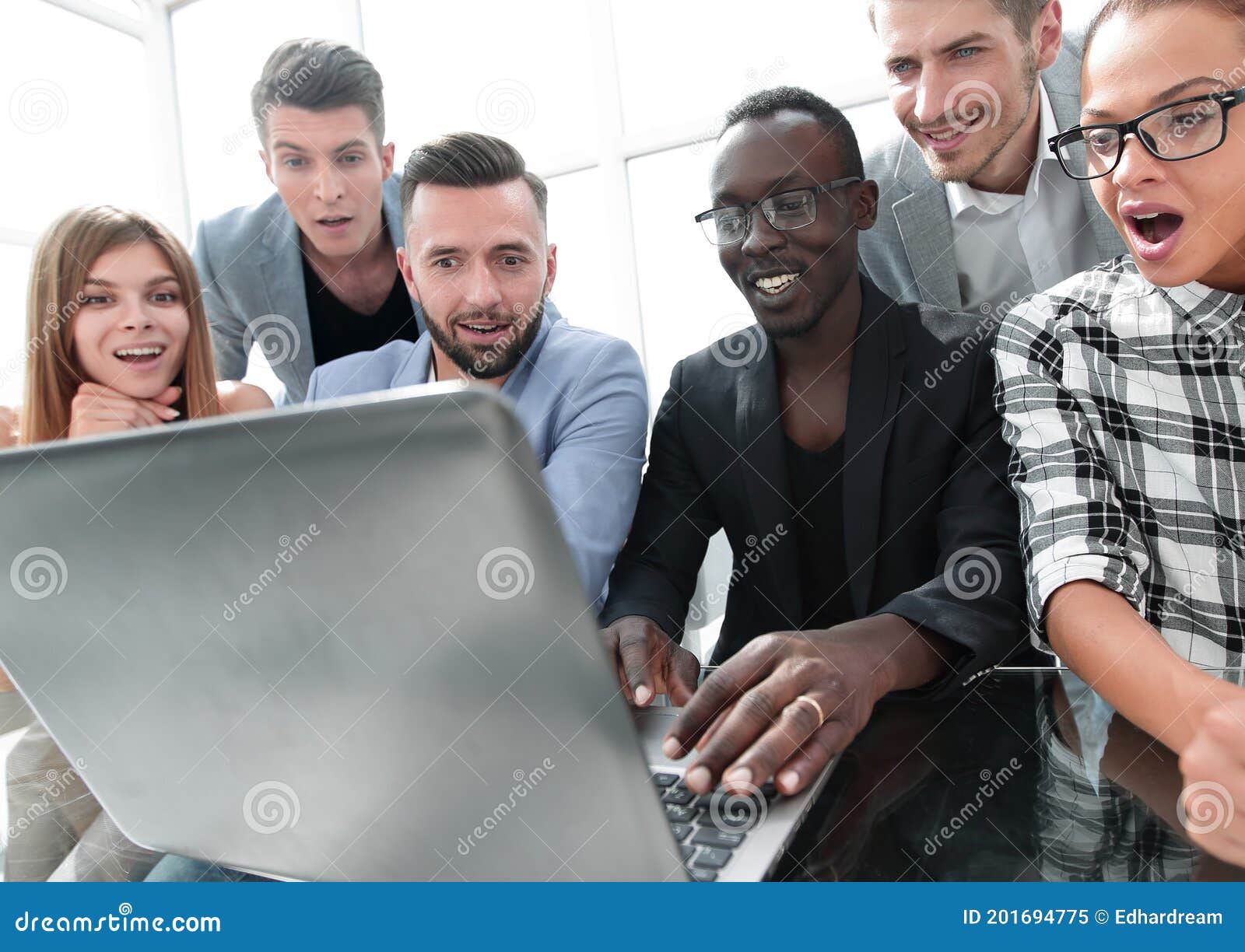 Young Colleagues Looking at Laptop with Smile on Face Stock Image ...