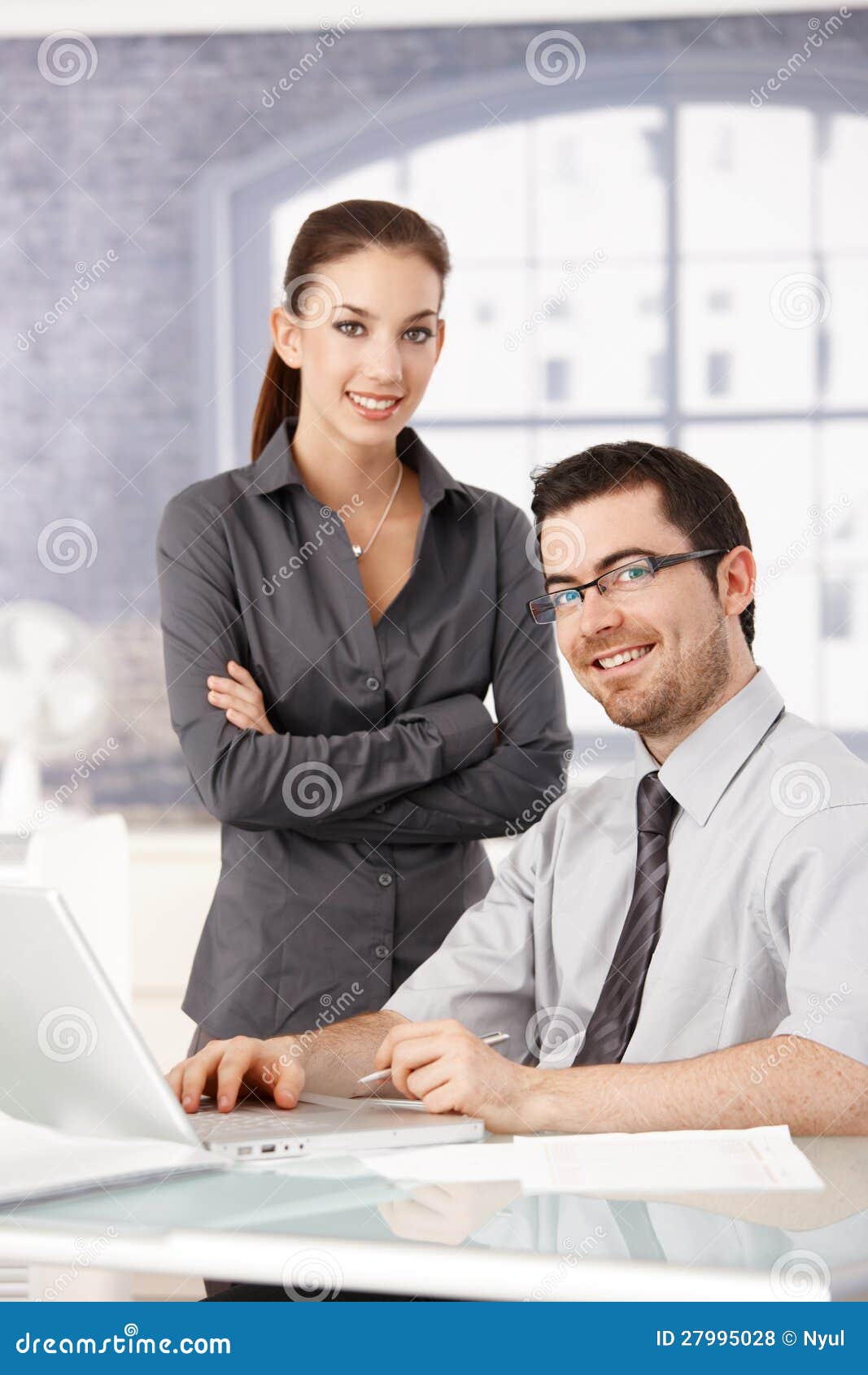 Young Colleagues Working Smiling in Bright Office Stock Photo - Image ...