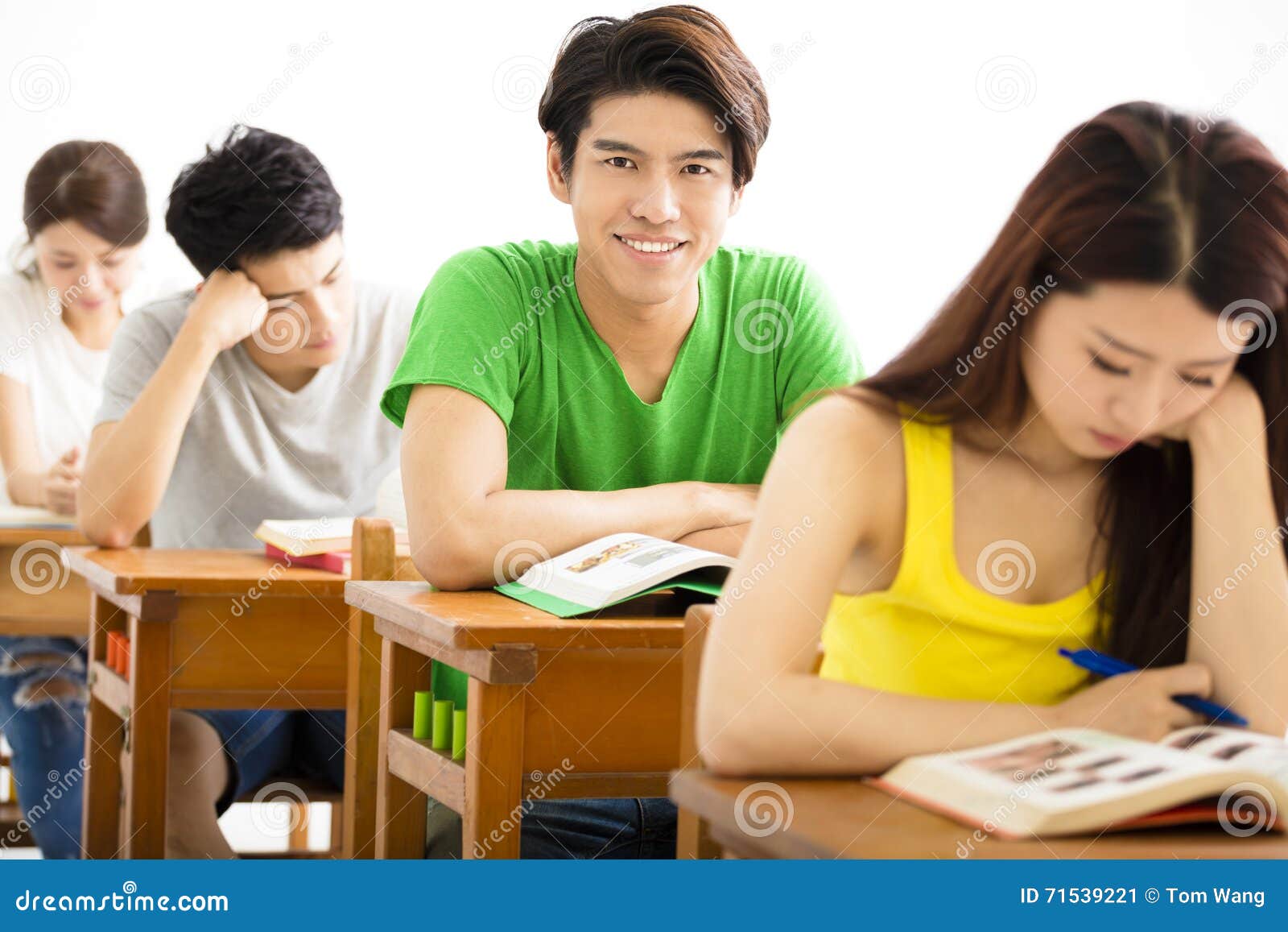 Young College Student Group Sitting in a Classroom Stock Image - Image ...