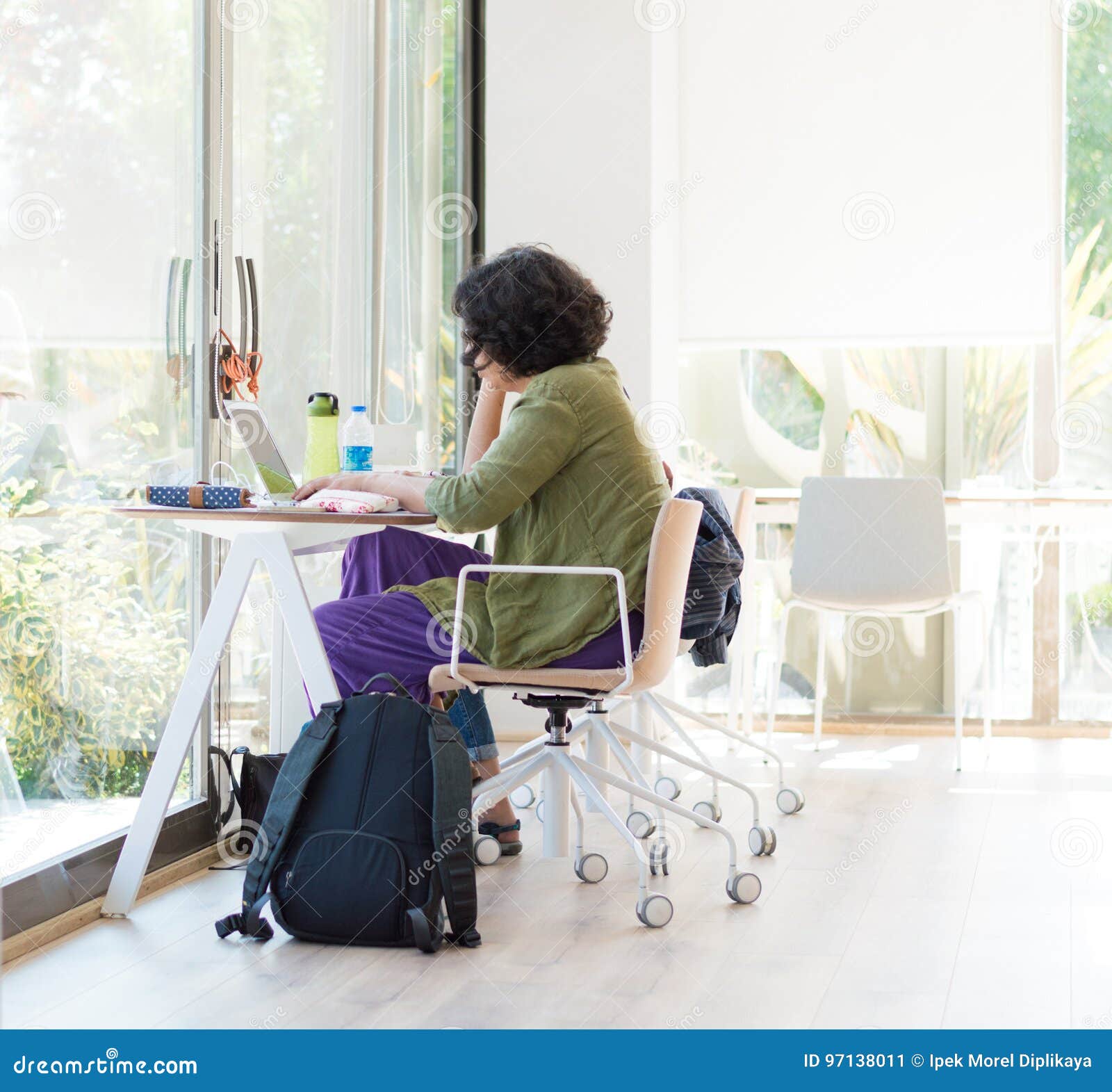 Young College Student Studying with Laptop in the University Lib Stock ...