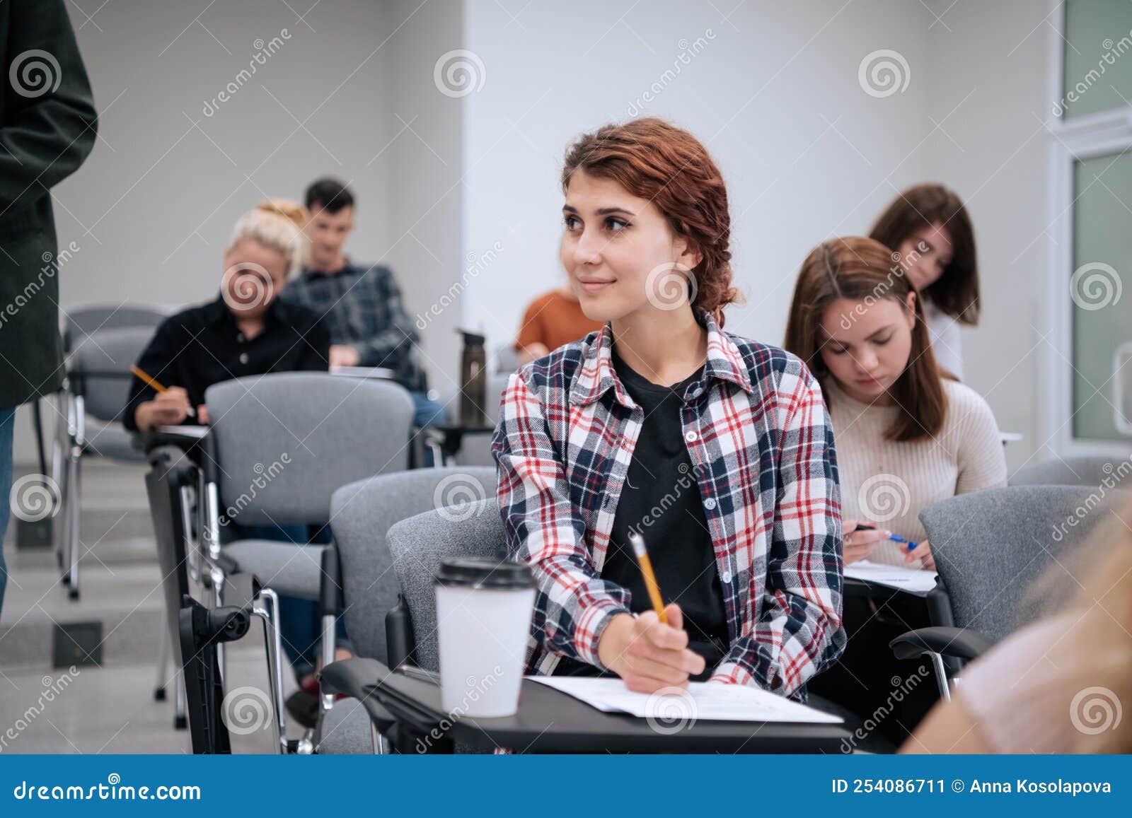 A Young College Student is Studying Modern Problems of Geopolitics in a ...