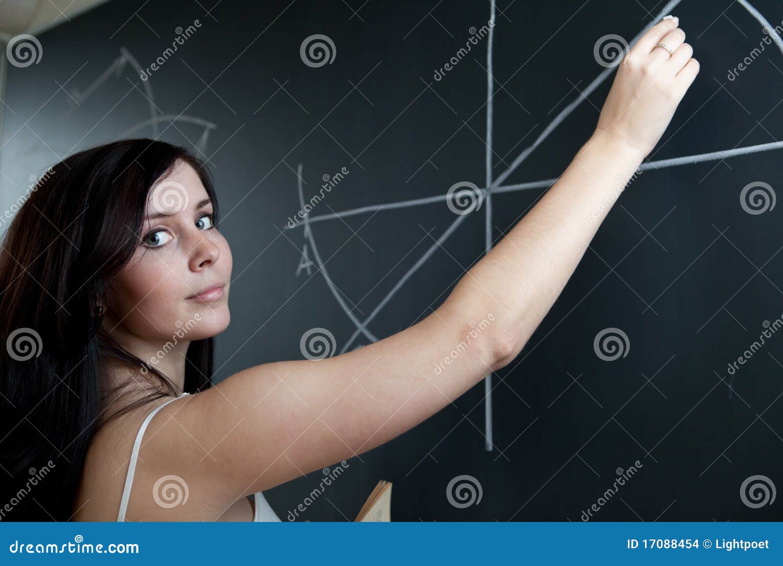 Young College Student Writing on the Chalkboard Stock Photo - Image of ...