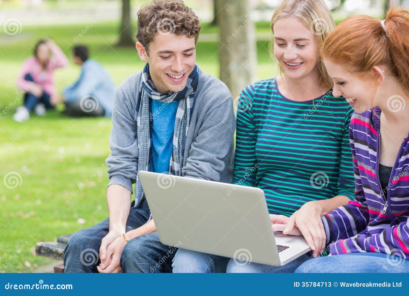 Young College Students Using Laptop in Park Stock Image - Image of ...
