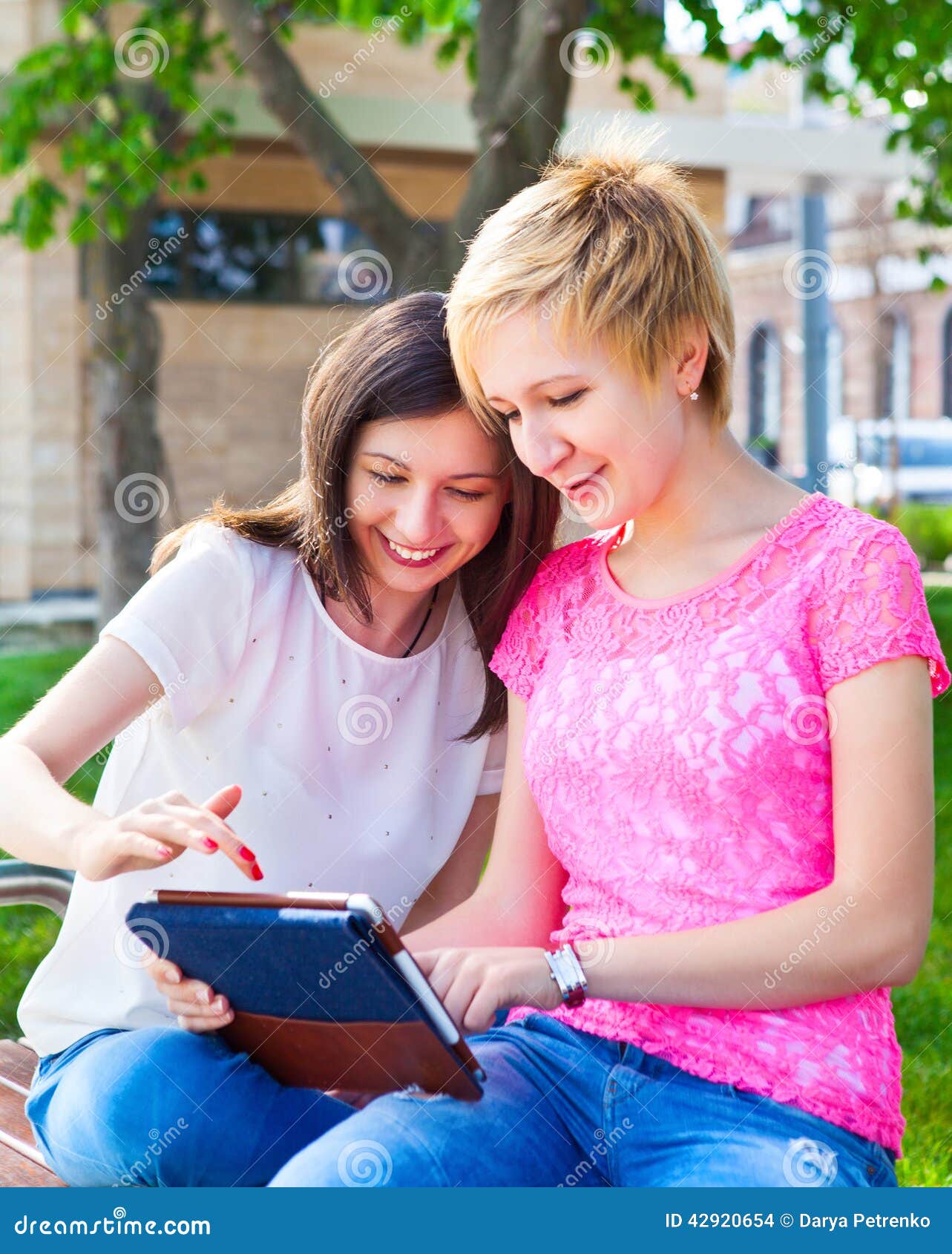 Young College Students Using Tablet Computer Stock Photo - Image of ...
