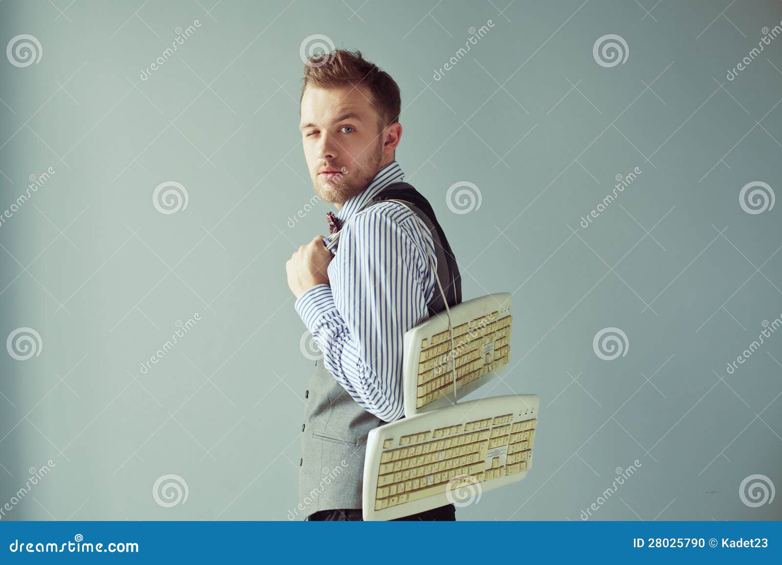 Young Computer Geek Carrying Keyboards Underhand Stock Photo - Image of ...