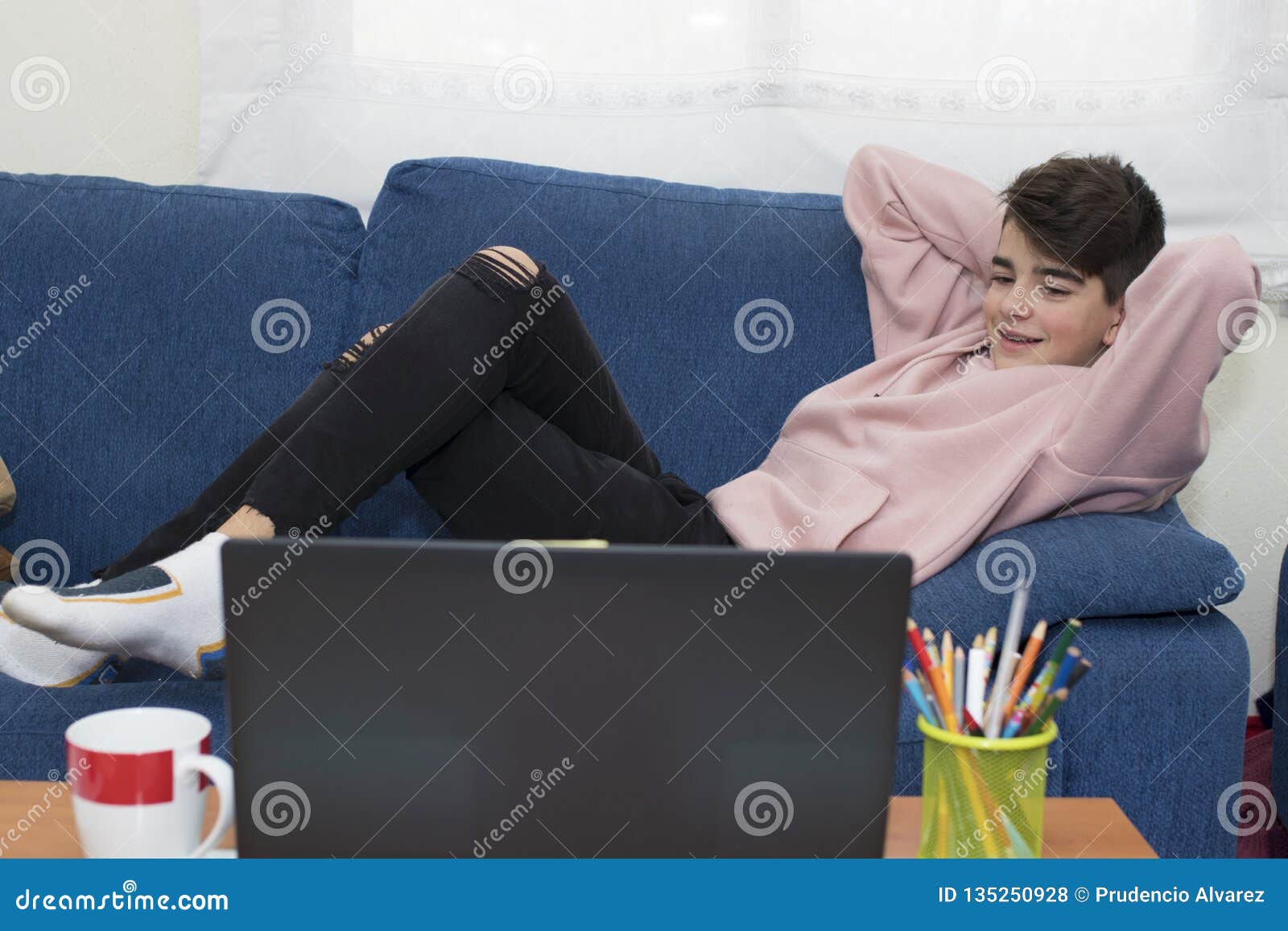 Young with Computer at Home Stock Photo - Image of social, sofa: 135250928