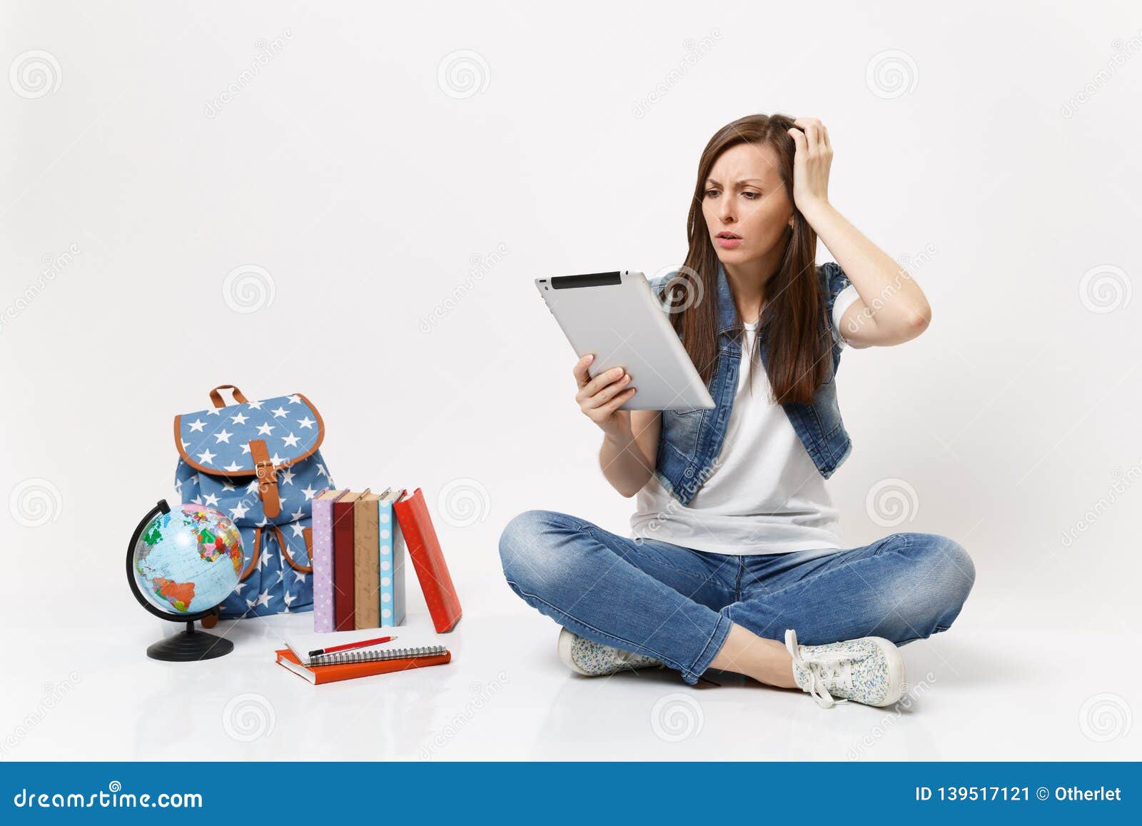 Young Concerned Woman Student Holding Using Tablet Pc Computer Keeping ...