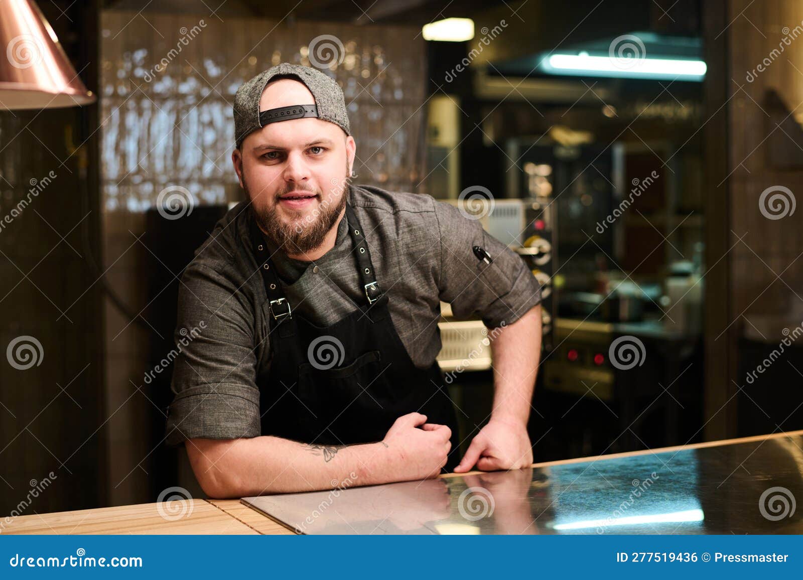 Young Confident Cook or Chef in Uniform Standing by His Workplace in ...