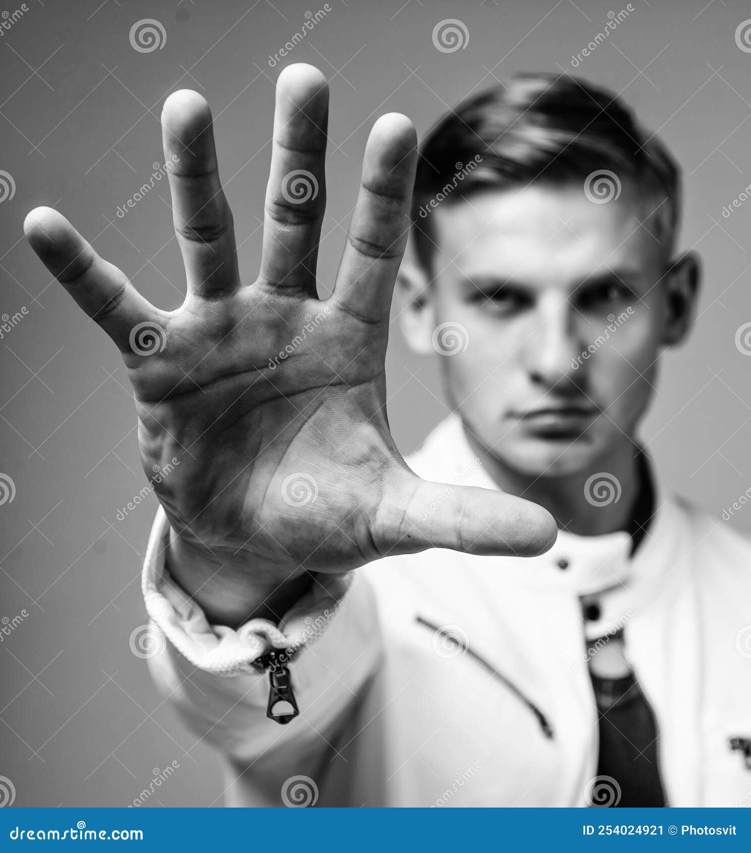 Young Confident Guy in White Urban Clothes with Open Hand, Gesture ...