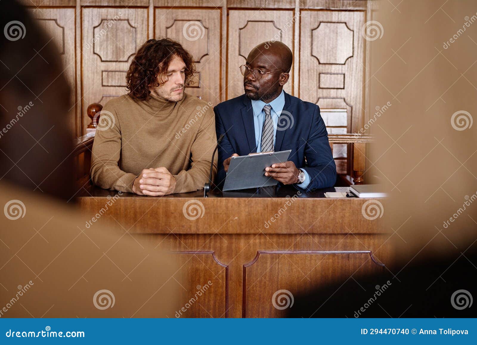 Young Confident Male Attorney Pointing at Document while Explaining ...