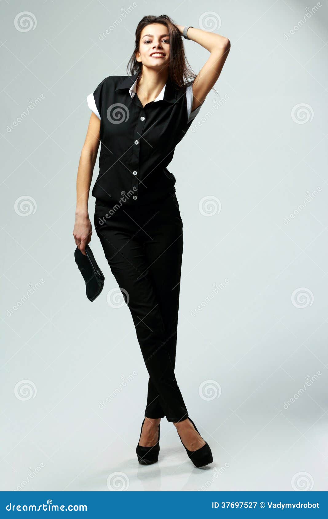 Young Confident Woman in Black Casual Clothes Standing Stock Image ... Young Confident Woman in Black Casual Clothes Standing Stock Image ...