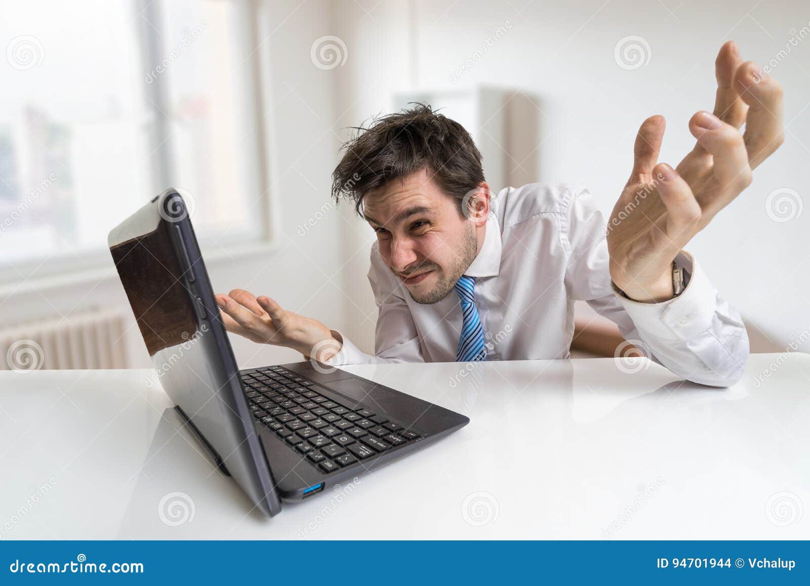 Young Confused Man is Working with Laptop Stock Photo - Image of ...