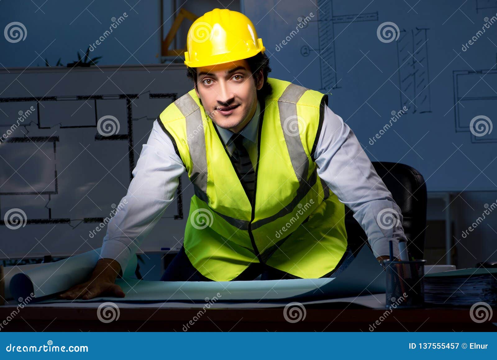 The Young Construction Architect Working on Project at Night Stock ...