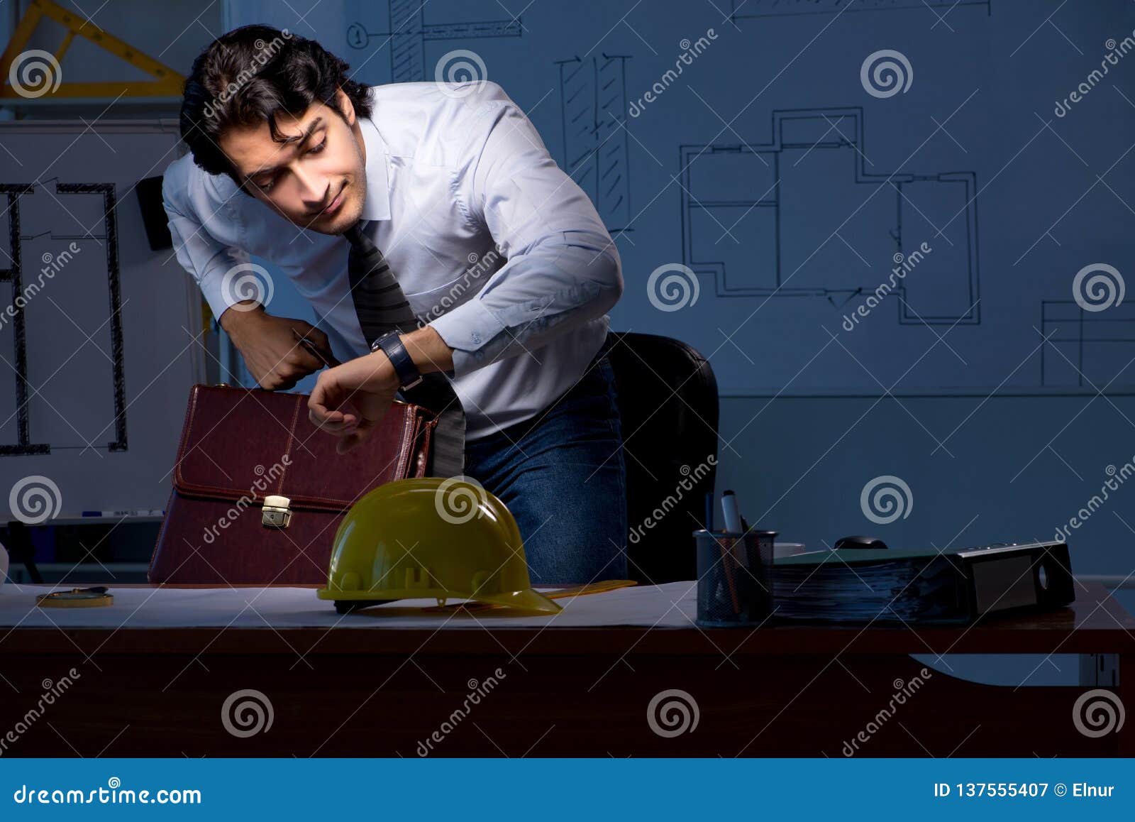 The Young Construction Architect Working on Project at Night Stock ...