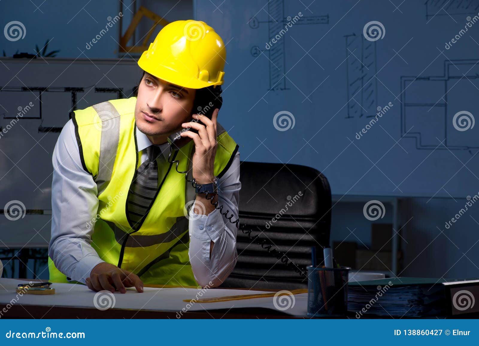 The Young Construction Architect Working on Project at Night Stock ...