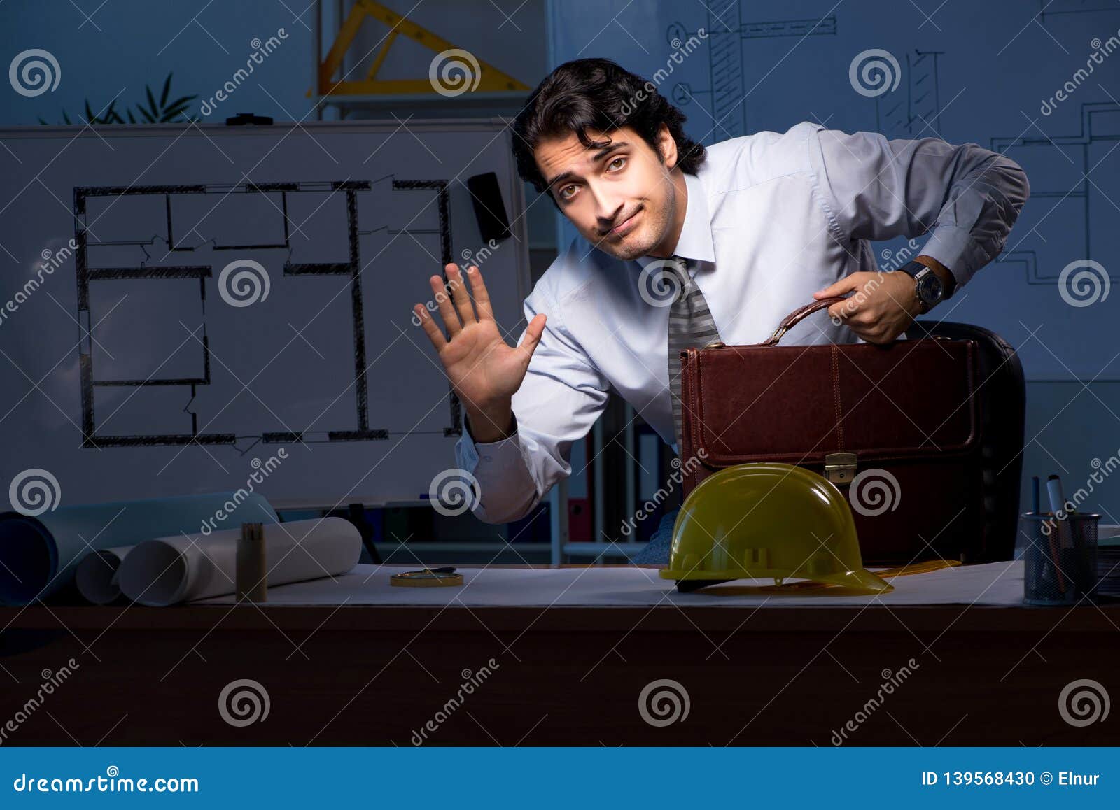 The Young Construction Architect Working on Project at Night Stock ...